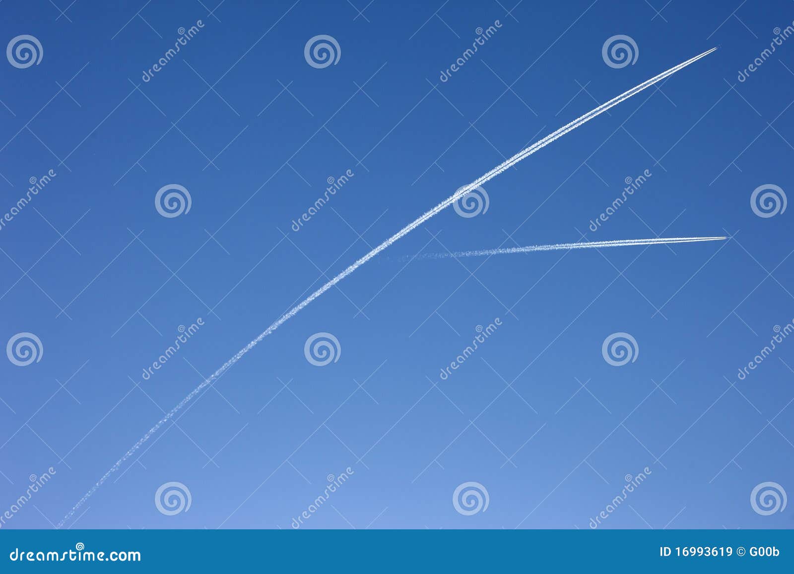 Airplane Trails Across a Pure Blue Sky Stock Image - Image of plane ...