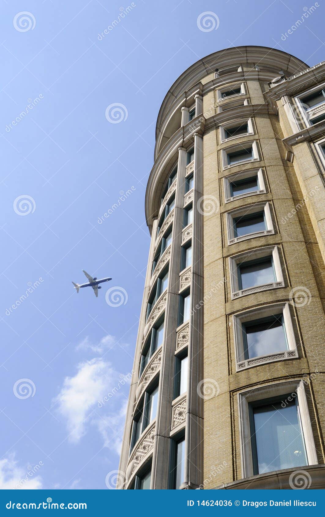 Airplane And Vertical Building Stock Photo - Image of clouds ...