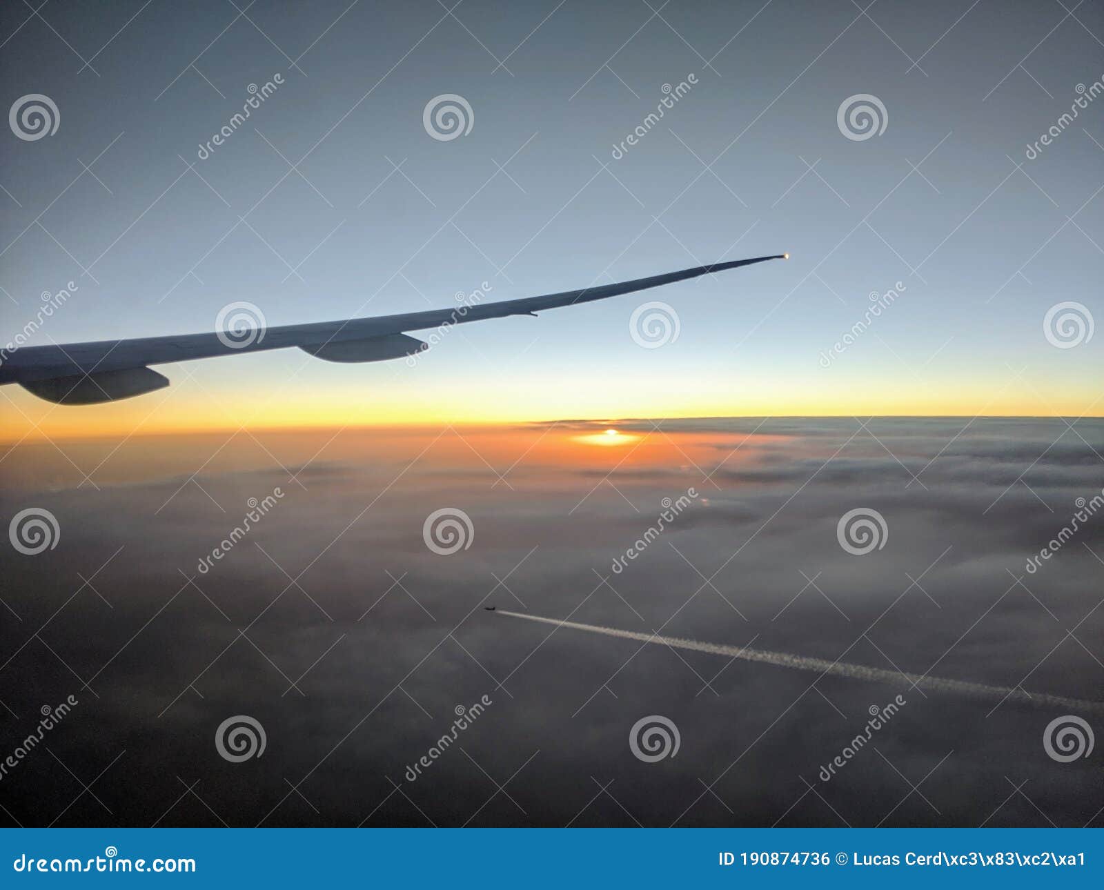 Airplane Wing Aerial View of Sunset and Clouds Stock Photo - Image of ...