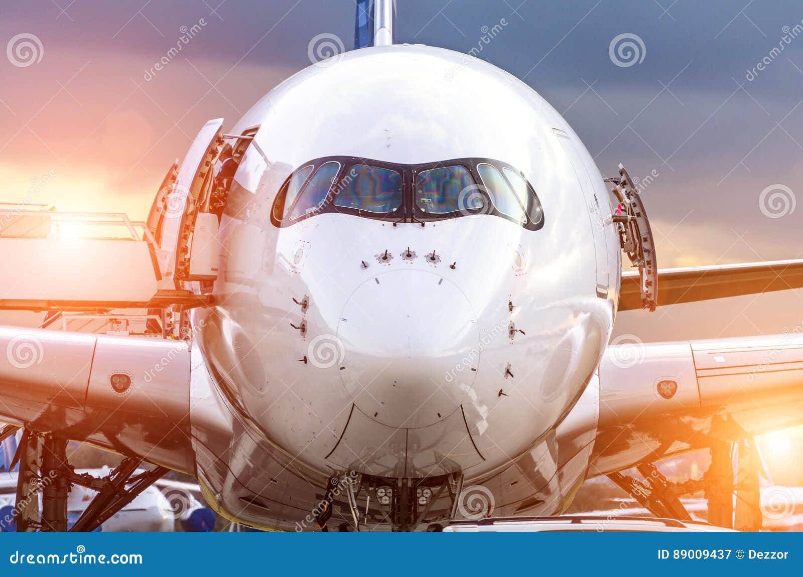 Airplane View from the Front Cockpit Fuselage at Sunset at the Airport ...