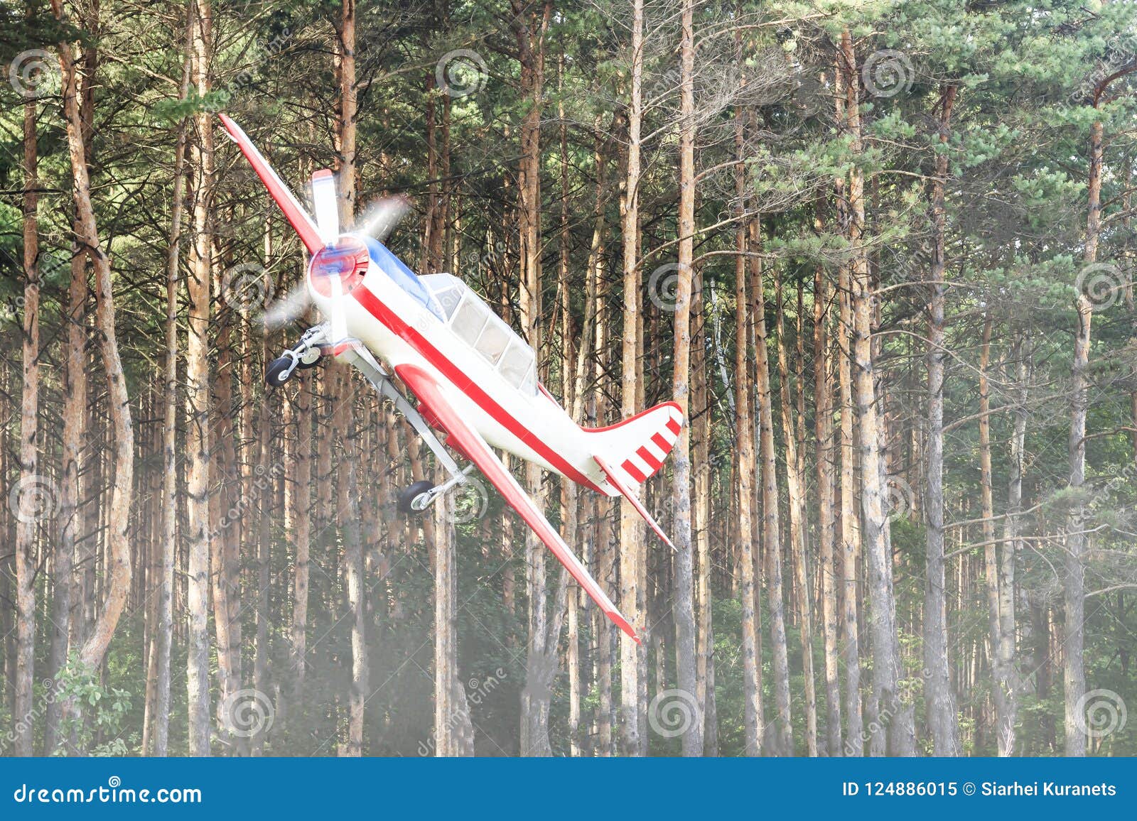 An Airplane of a Vintage Single Engine with Screws Flying Over the ...