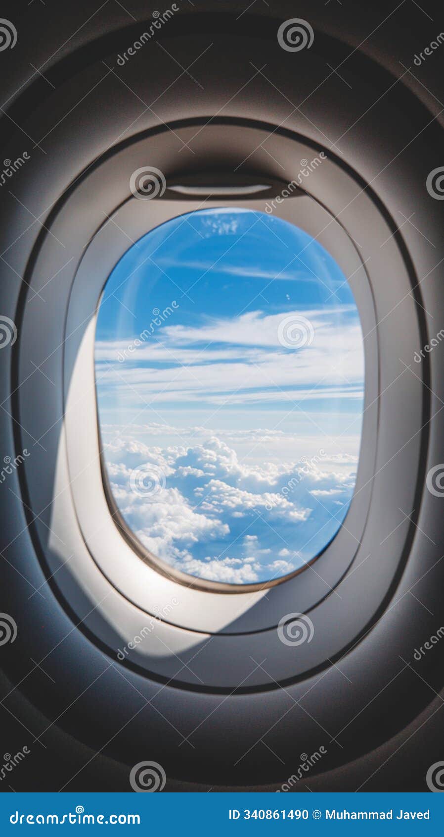 Airplane Window Frames Clear Sky with Clouds, Symbolizing Adventure ...