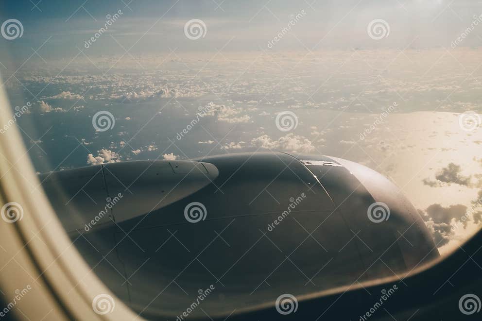 Airplane Window View with Engine and Clouds. Stock Image - Image of ...