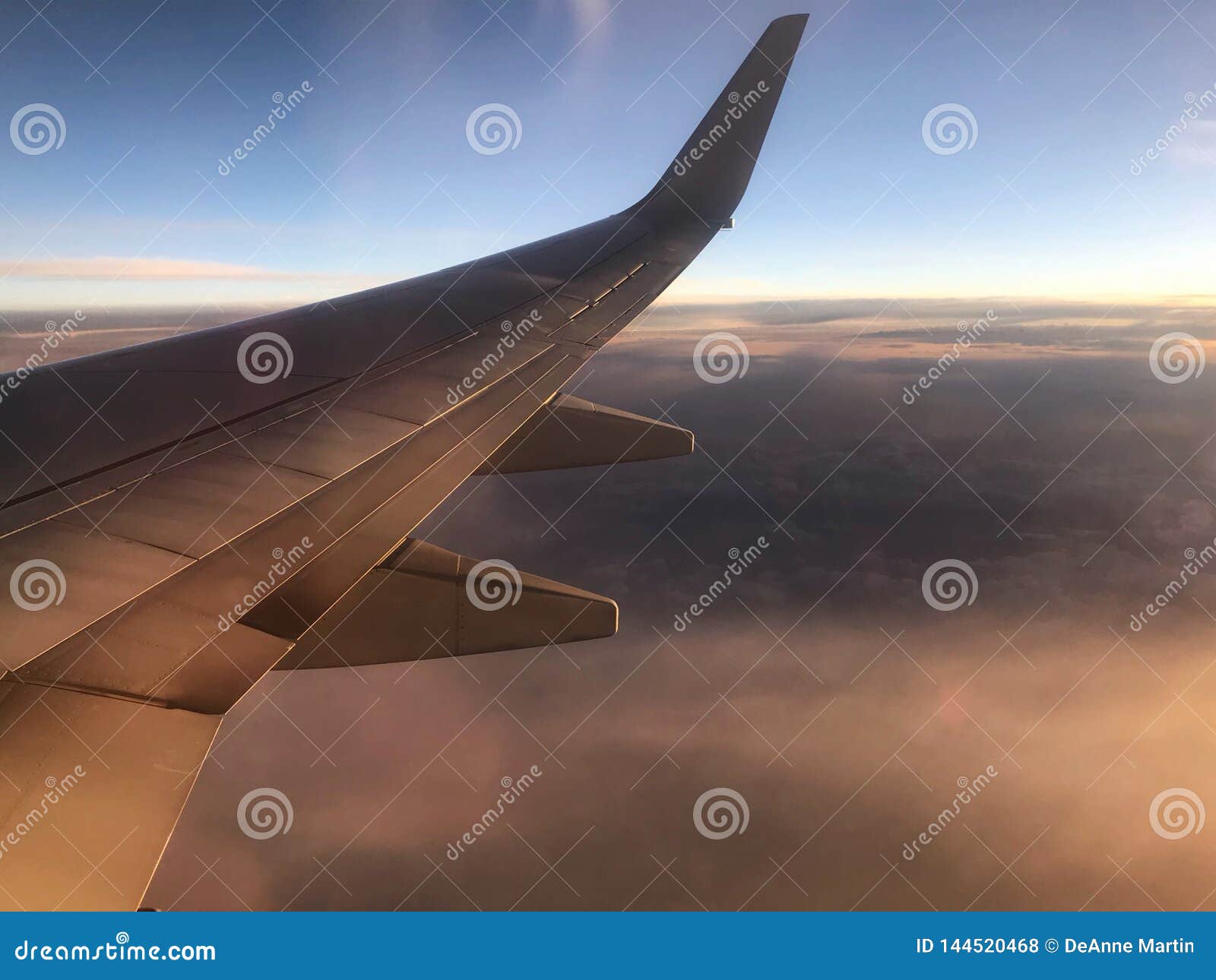 Airplane Window View stock photo. Image of wing, cliuds - 144520468