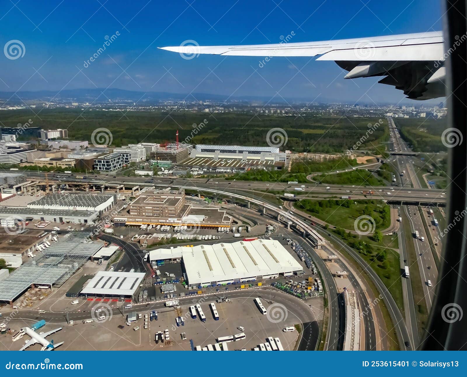 Airplane Window View of Wing, Highway Junctions and Green Forest. Stock ...