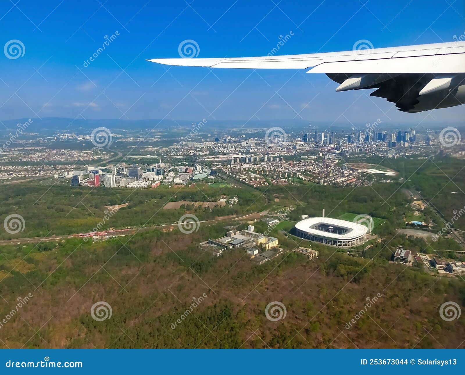 Airplane Window View of Wing, Highway Junctions and Green Forest. Stock ...