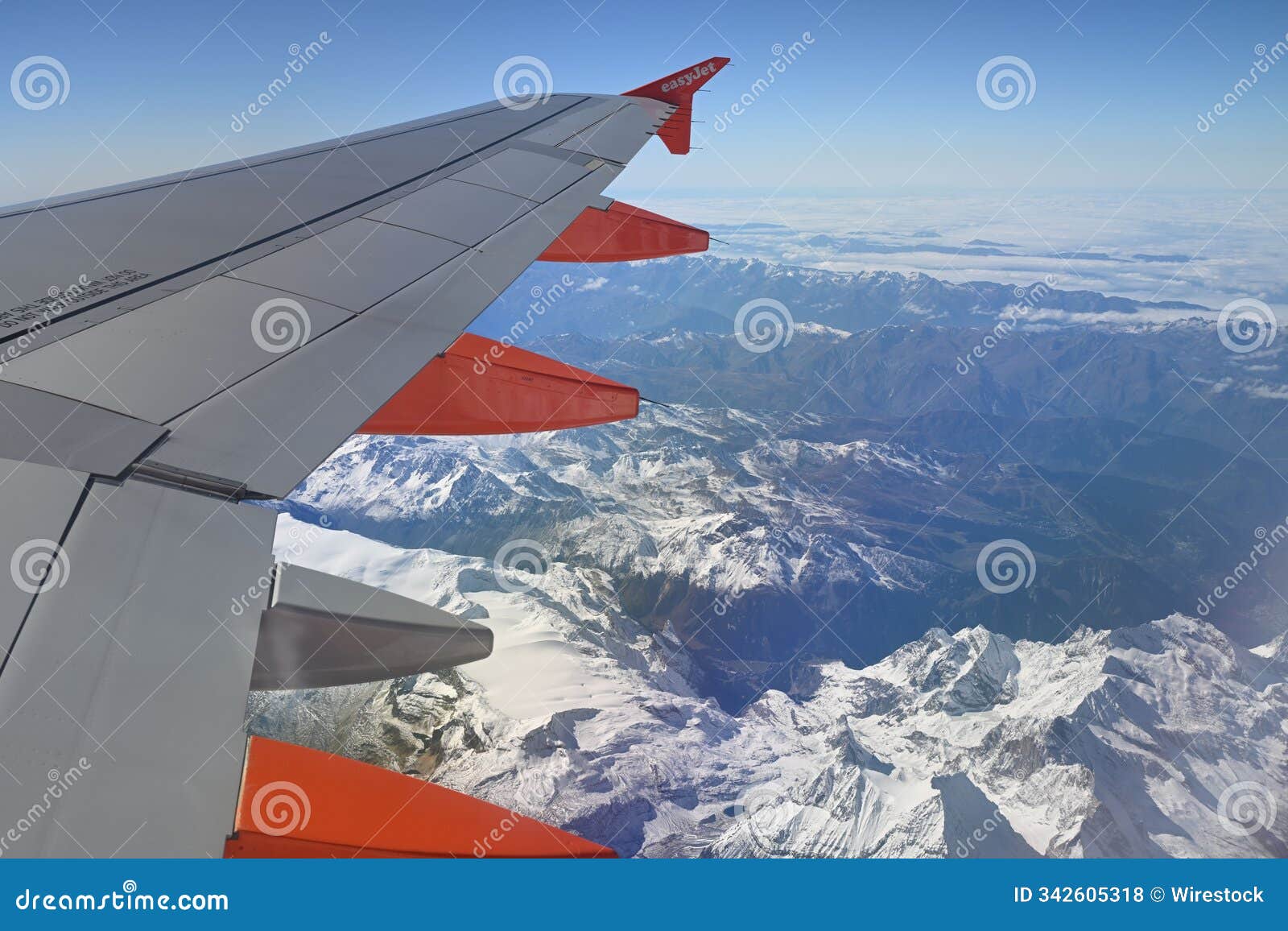 Airplane Window View with Wing and Orange Elements Editorial Stock ...