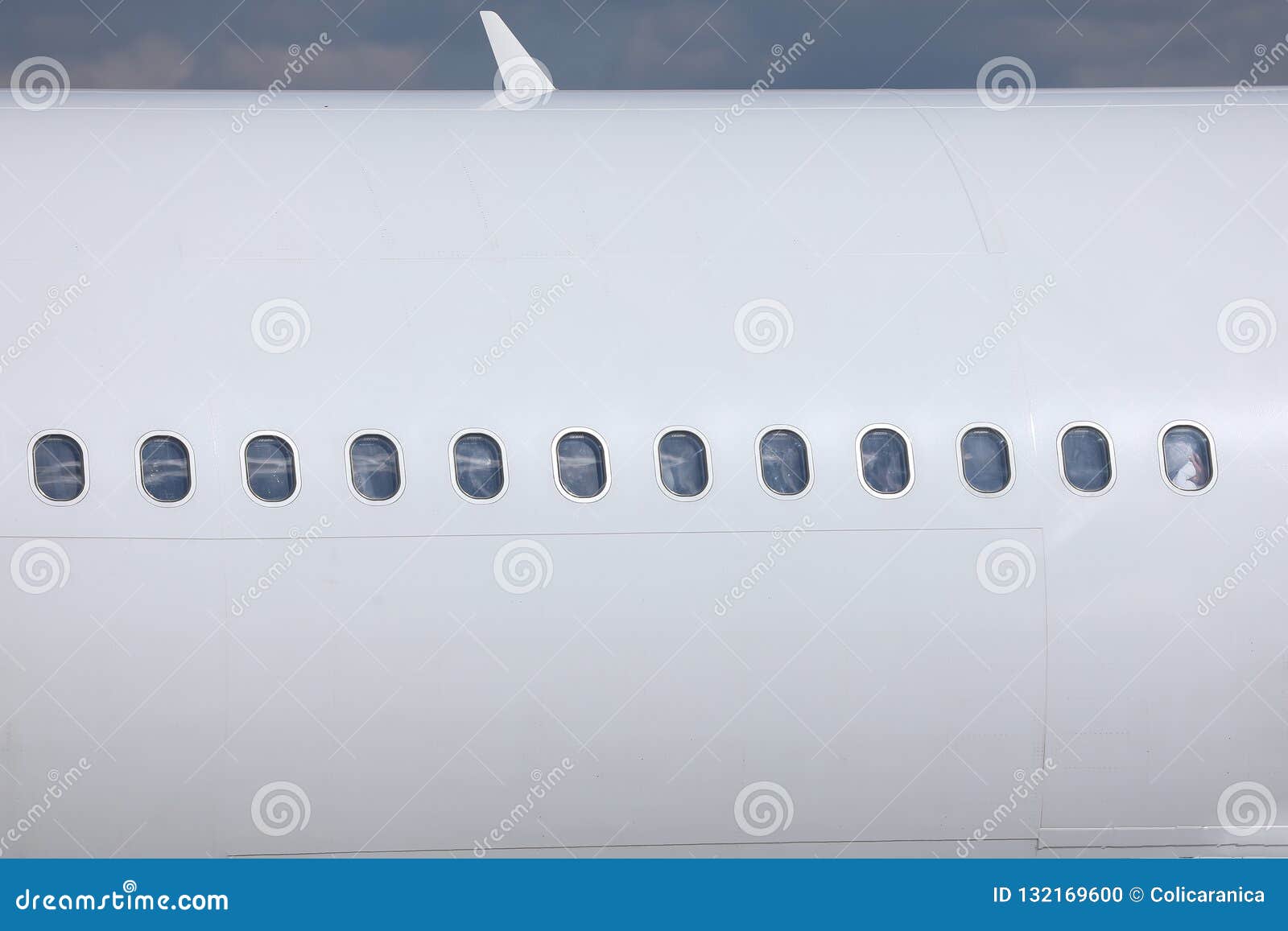 Airplane windows, close-up stock photo. Image of aircraft - 132169600