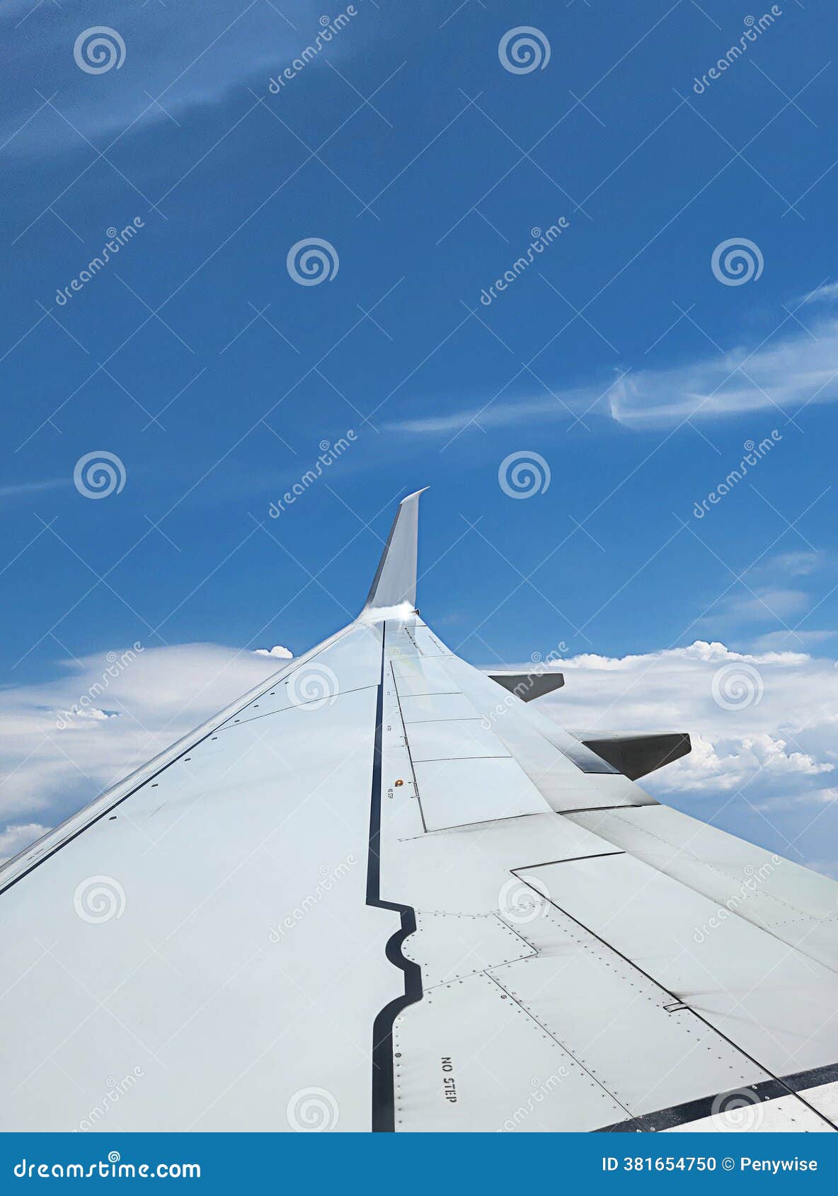 An Airplane Wing Above The Clouds Royalty-Free Stock Photo ...
