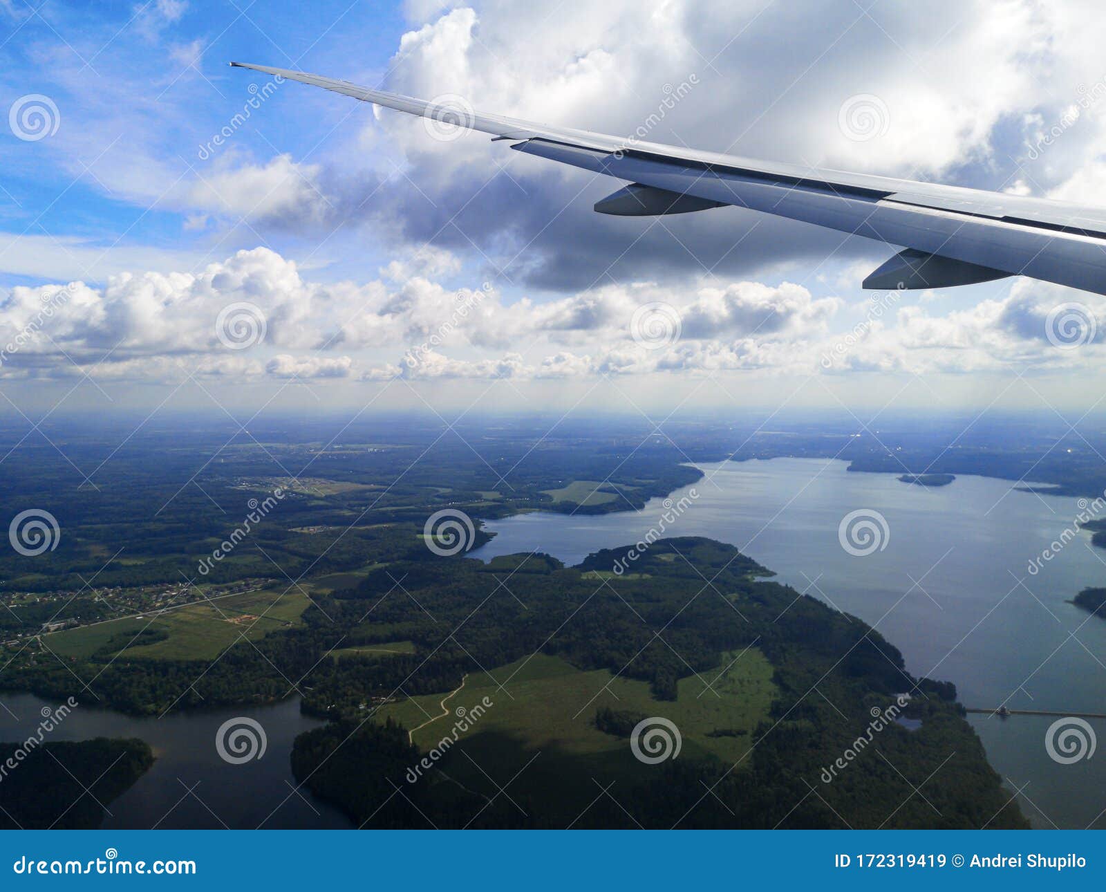 Airplane wing in flight stock image. Image of nature - 172319419