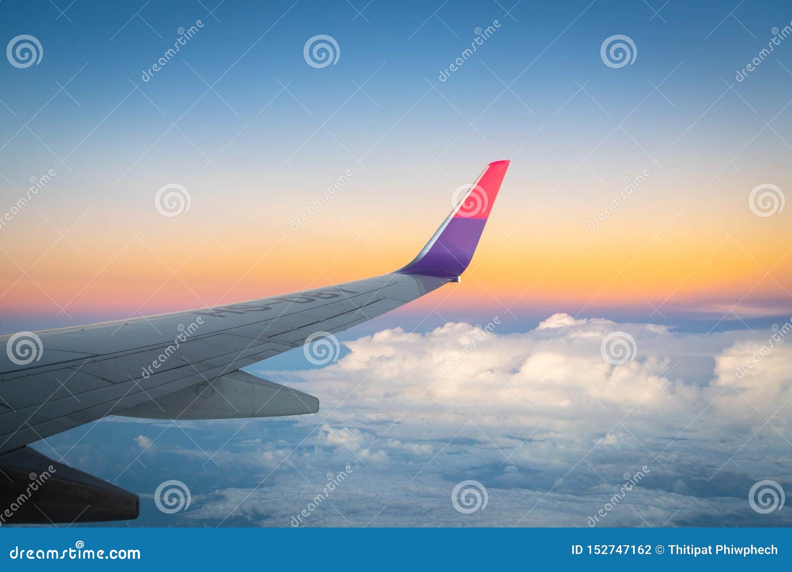 Airplane Wing in Flight from Window, Sunset Sky, Twilight Sky Stock ...