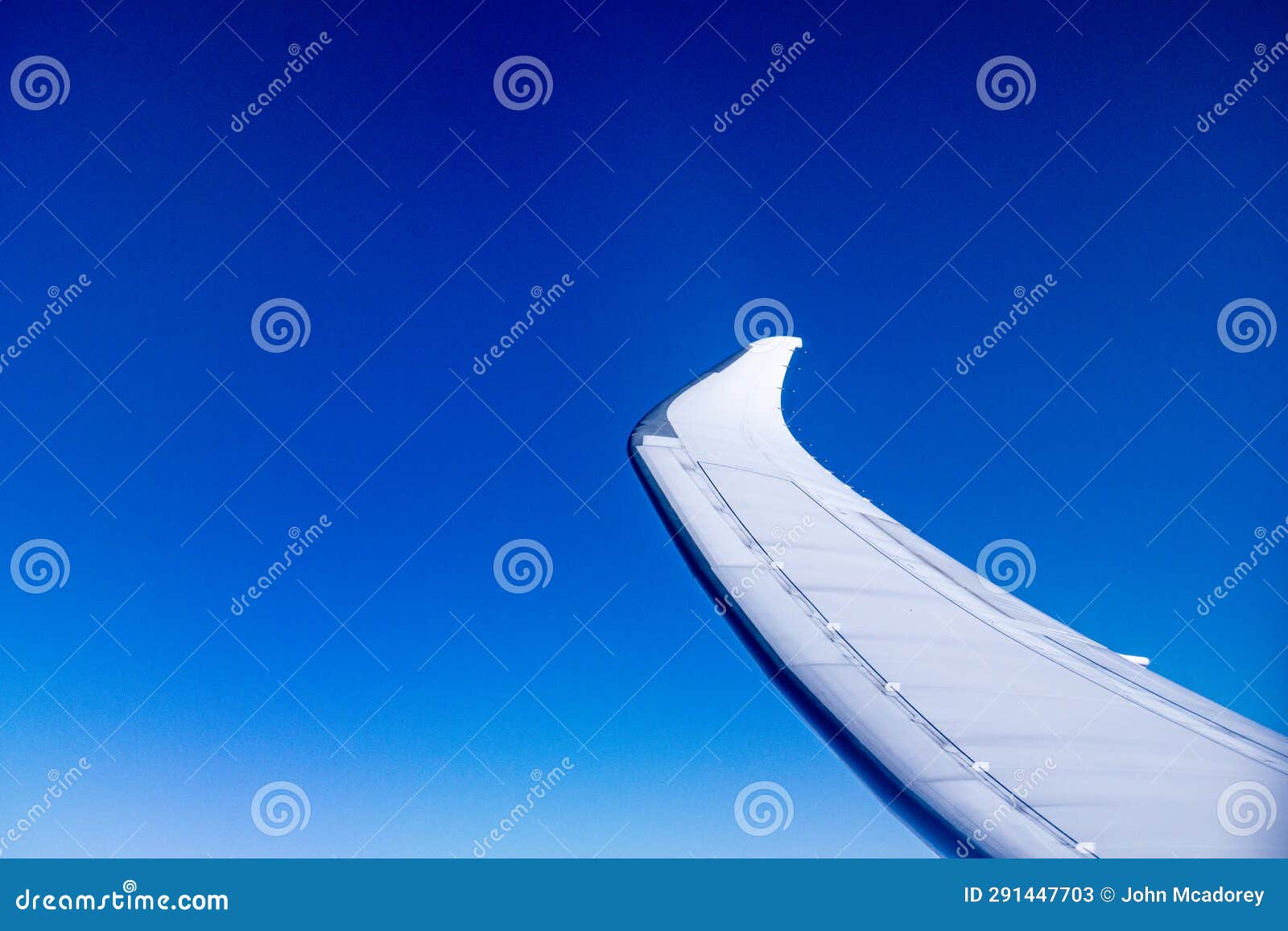 Airplane Wing in Flight with Winglet in a Blue Sky Stock Image - Image ...