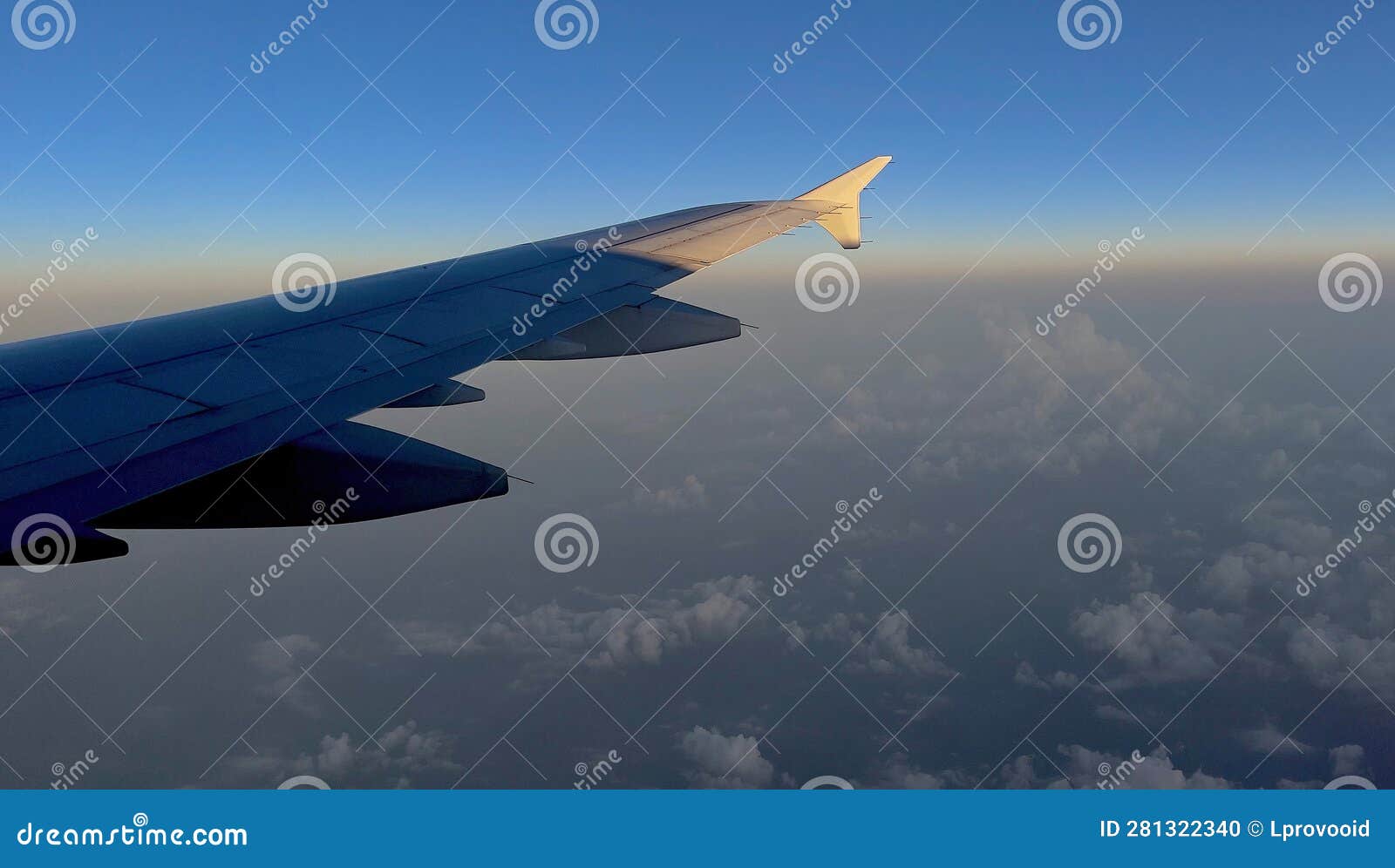Airplane Wing with Golden and Blue Hour Light Stock Photo - Image of ...