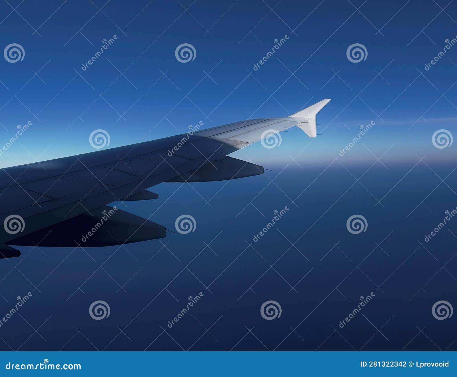Airplane Wing with Golden and Blue Hour Light Stock Photo - Image of ...