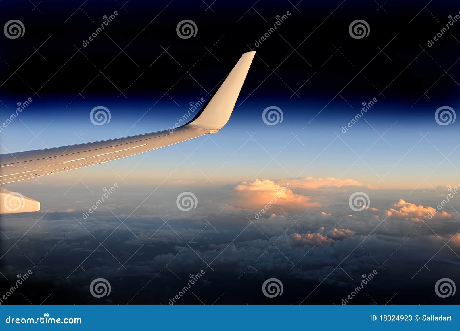 Airplane Wing High Up at Dusk. Stock Image - Image of atmosphere ...