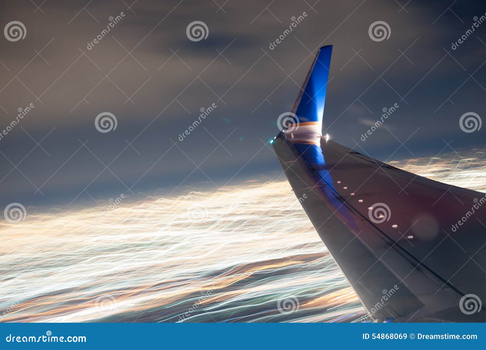 Airplane wing at night. stock image. Image of international - 54868069