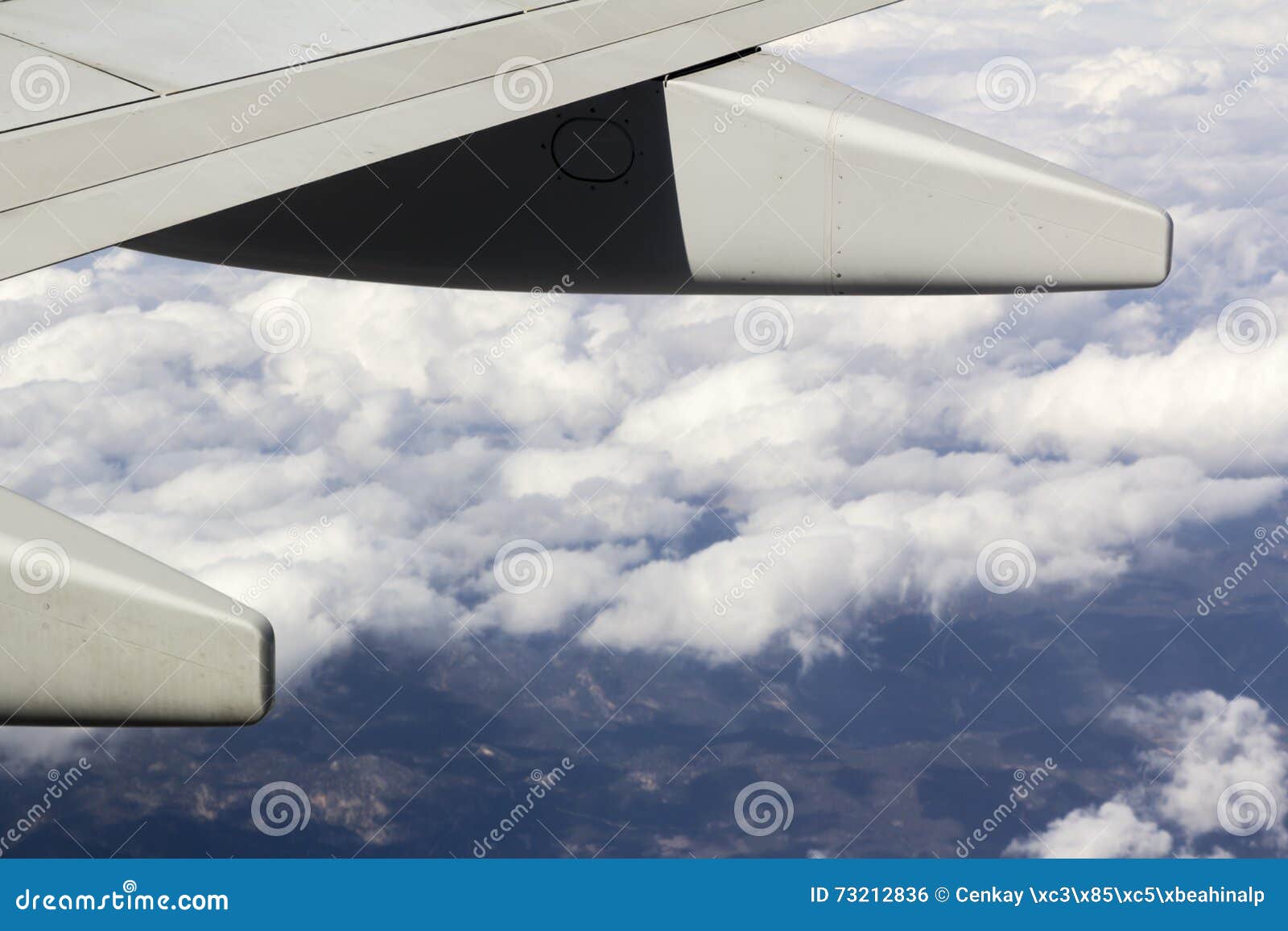 Airplane Wing from Plane Above the Clouds Stock Photo - Image of aerial ...