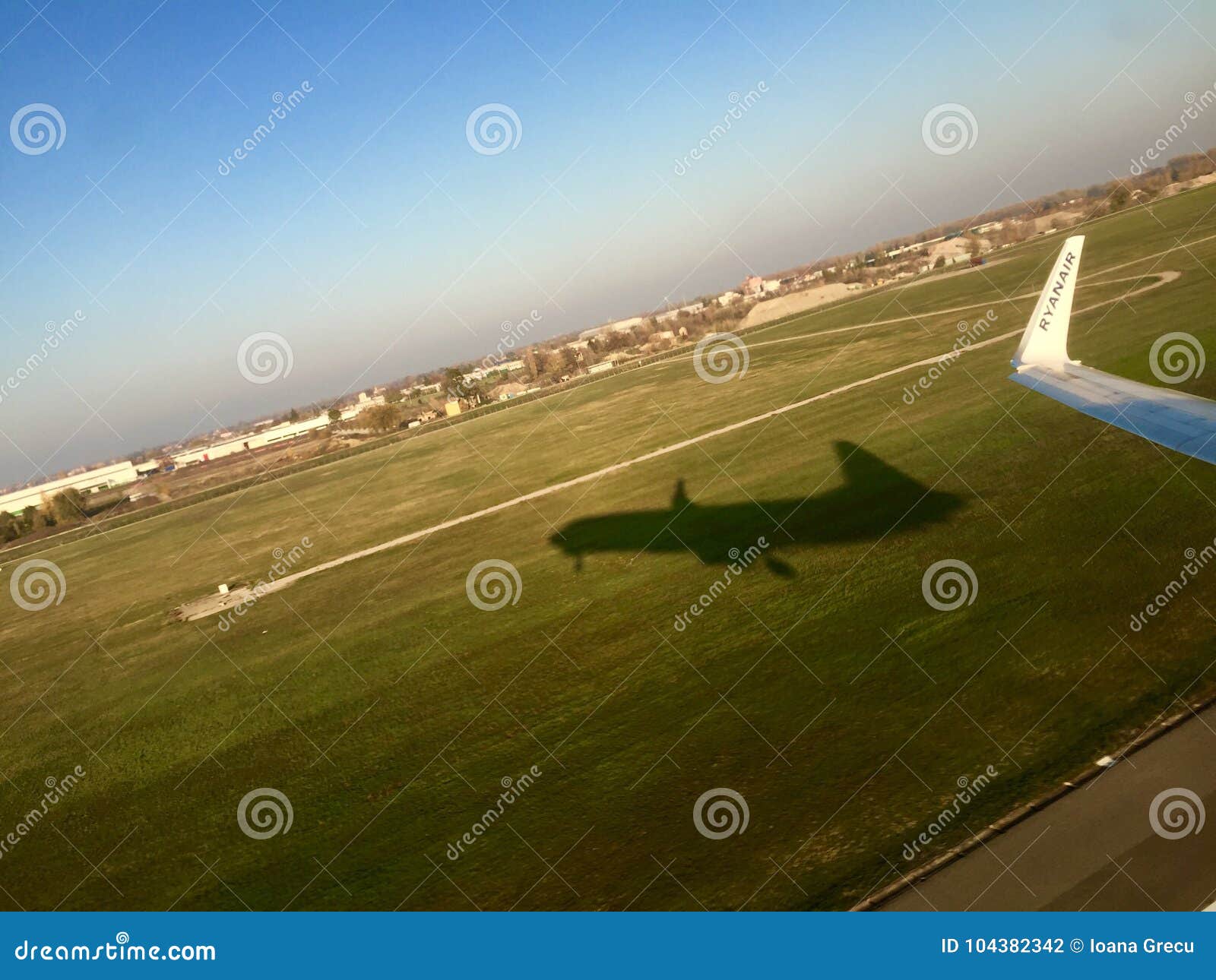 Airplane Wing and Shadow at Take Off Editorial Photography - Image of ...