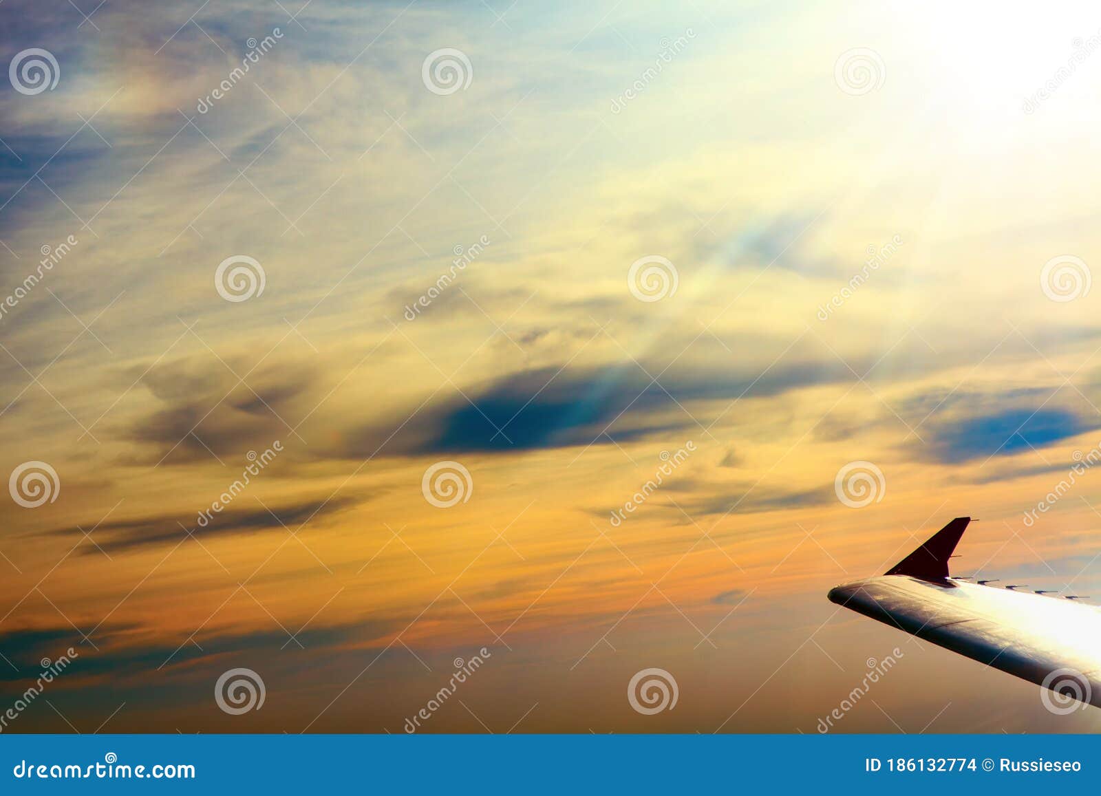 Airplane Wing in the Sunlight Stock Photo - Image of sunlight, nature ...