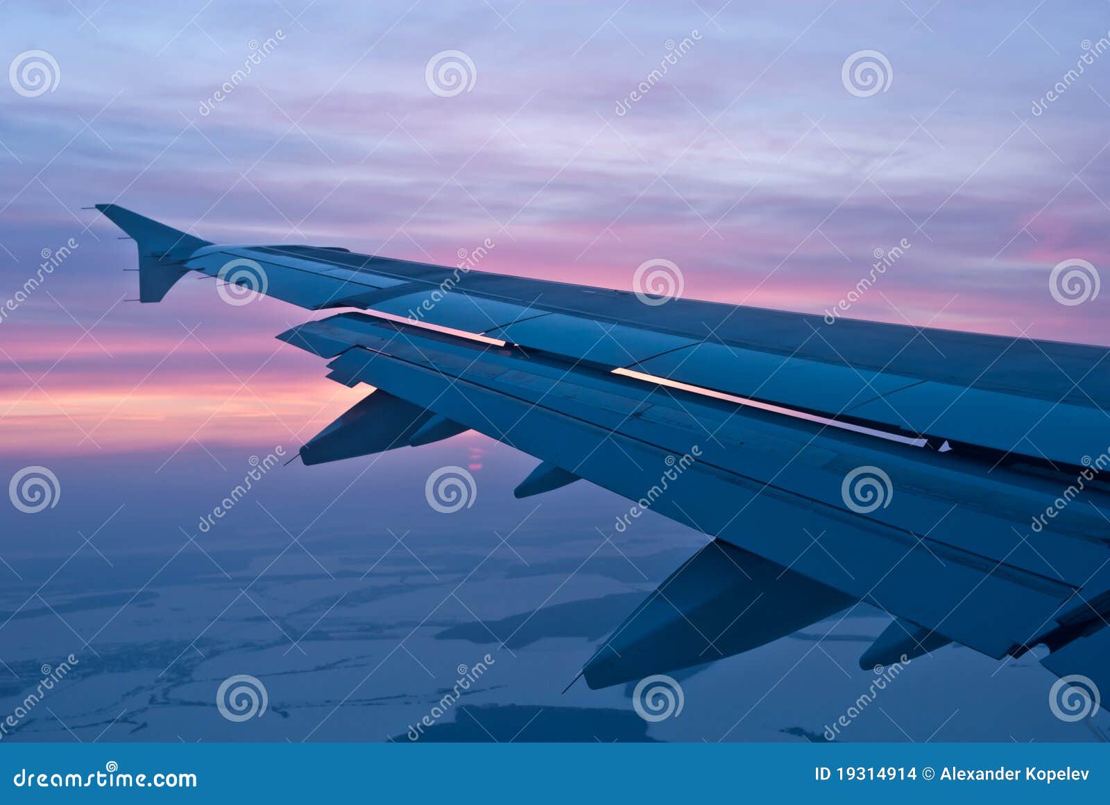 Airplane wing, sunset stock photo. Image of purple, cumulonimbus - 19314914