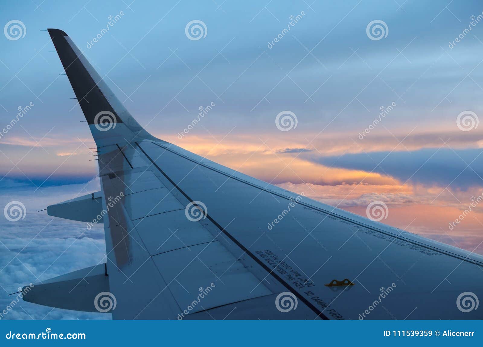 Flying over sunset stock image. Image of airplane, cloudscape - 111539359