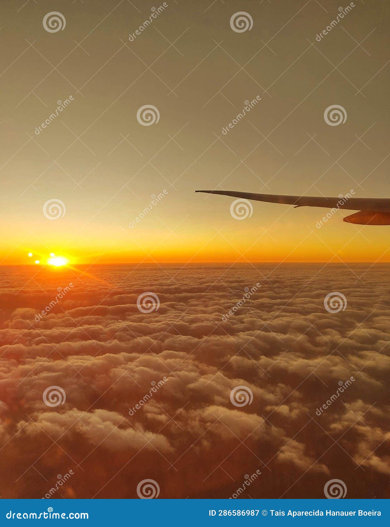 Airplane Wing View through Airplane Window at Sunset. Stock Image ...