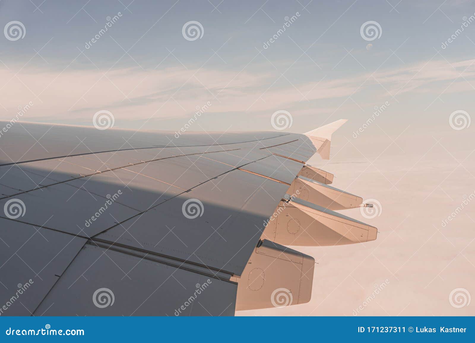 Airplane Wing through the Airplane Window Stock Image - Image of ...
