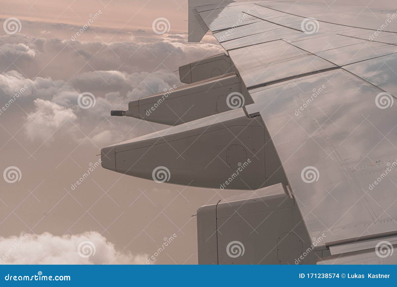 Airplane Wing through the Airplane Window Stock Photo - Image of high ...