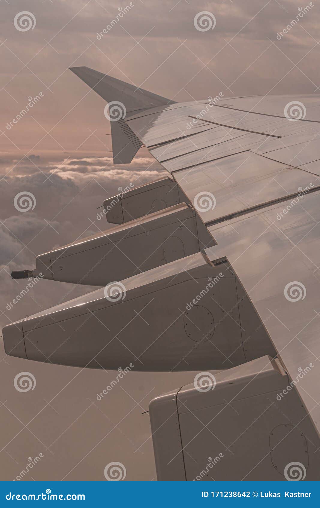 Airplane Wing through the Airplane Window Stock Photo - Image of ...