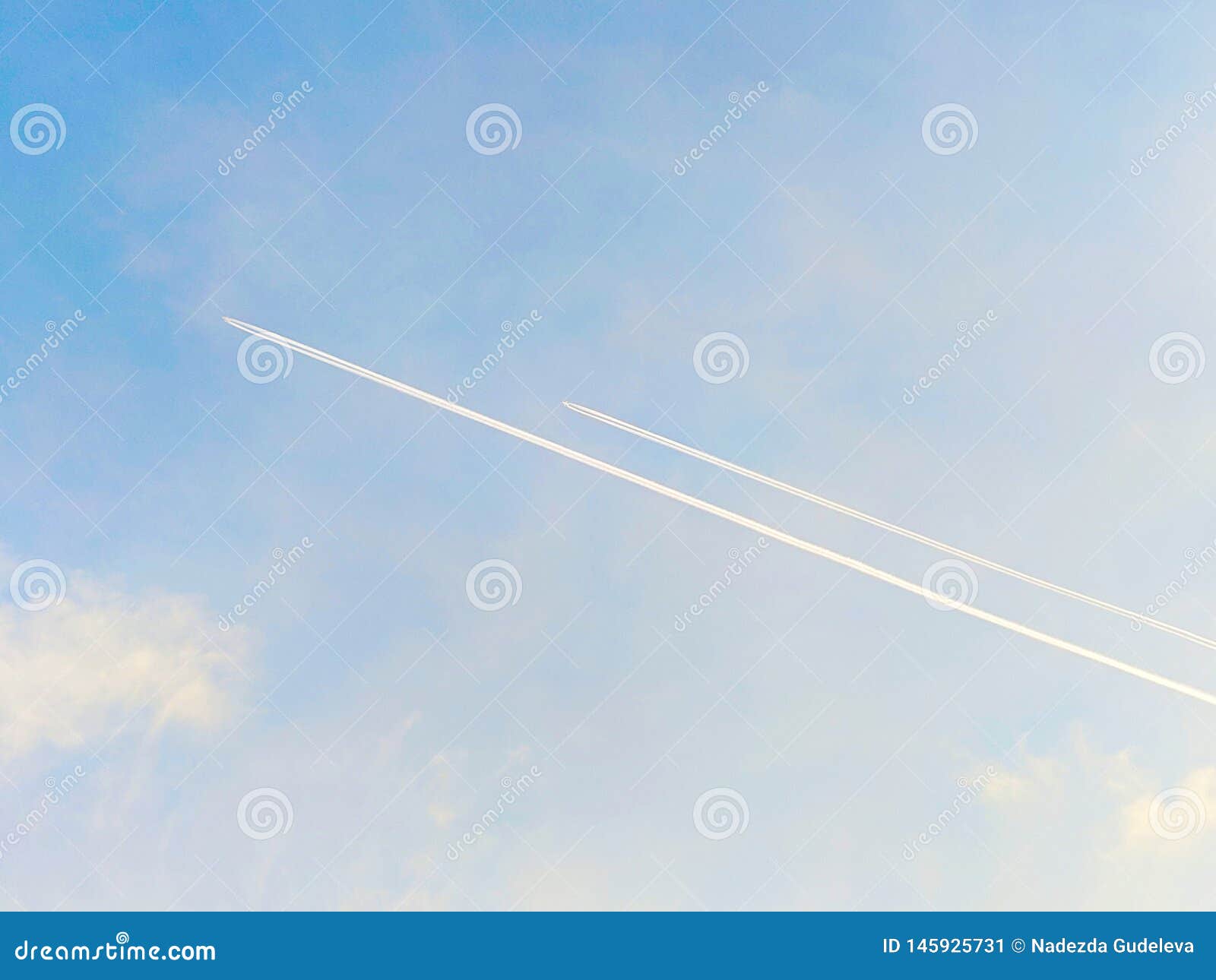 Airplanes Flying with Trail in the Blue Sky. Stock Image - Image of ...