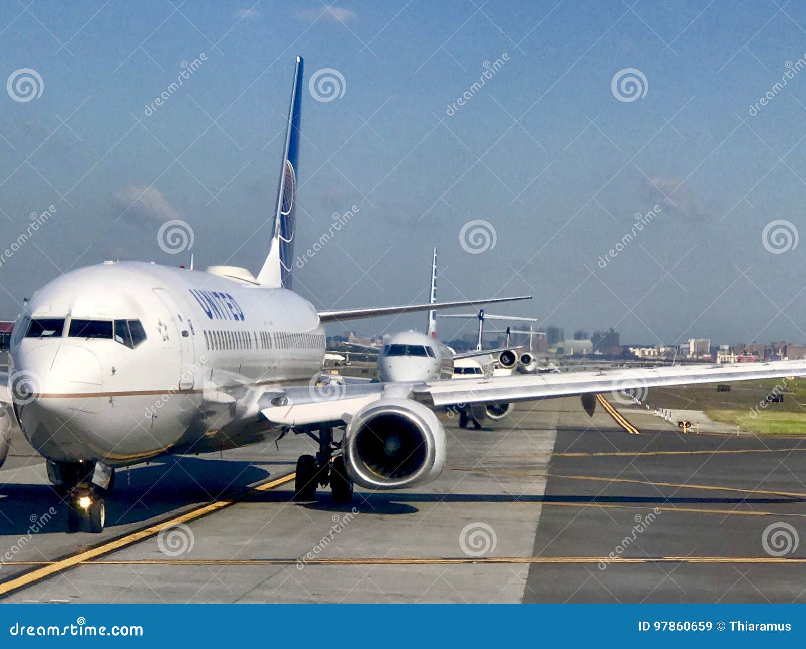 Airplanes in line editorial stock image. Image of flight - 97860659