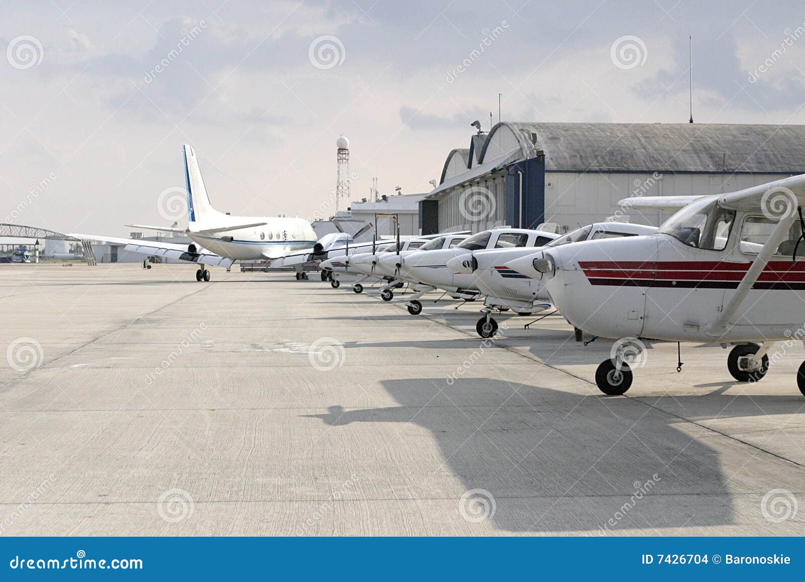 Airplanes in a Row stock photo. Image of weather, white - 7426704