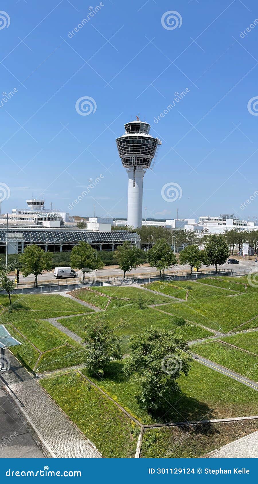 Airport Control Tower Overseeing Operations on a Clear Day. Stock Photo ...