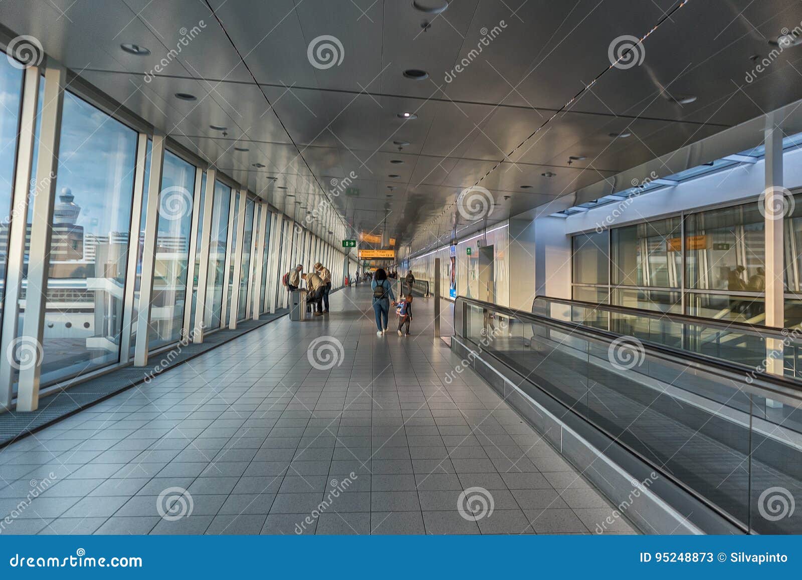 Airport Corridor with People Walking. Editorial Stock Photo - Image of ...