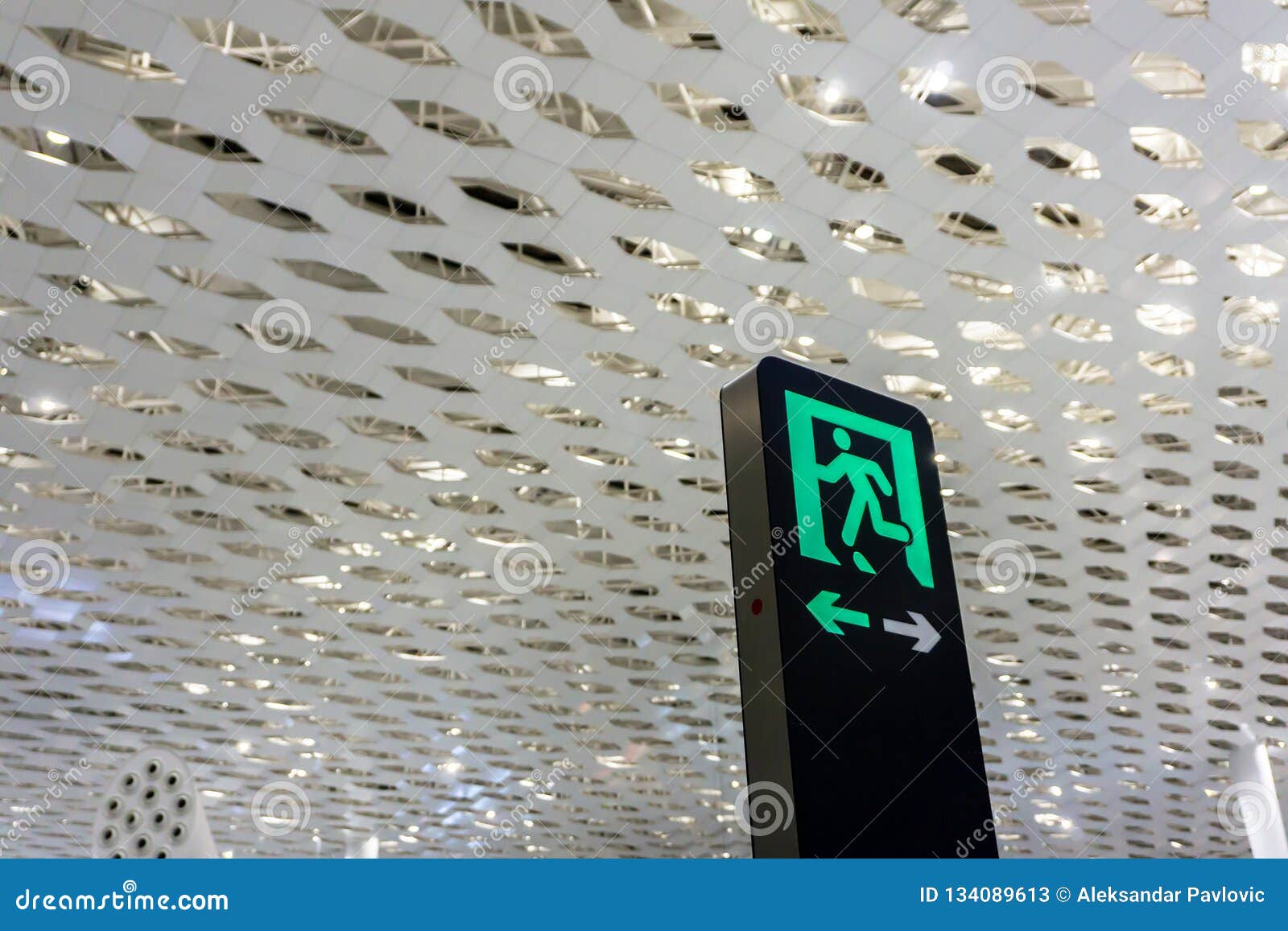 Airport Emergency Exit Sign At An International Airport Stock Photo ...