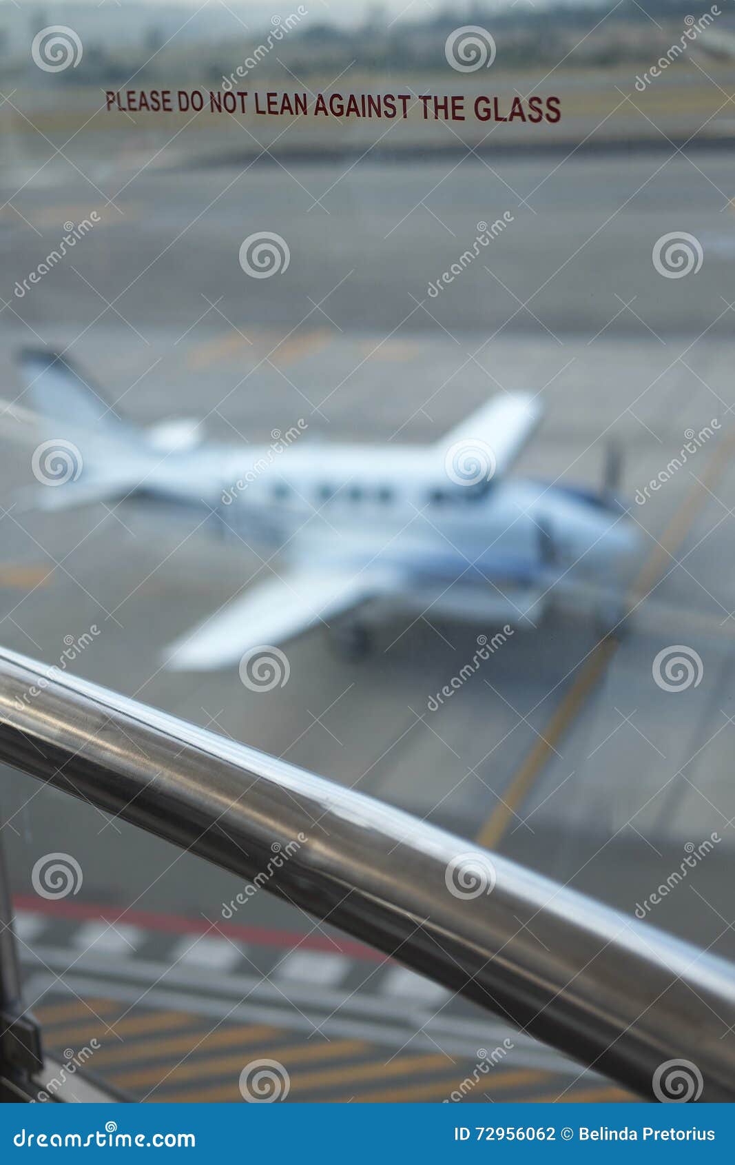 Airport Glass with Plane in Background Stock Photo - Image of airstrip ...