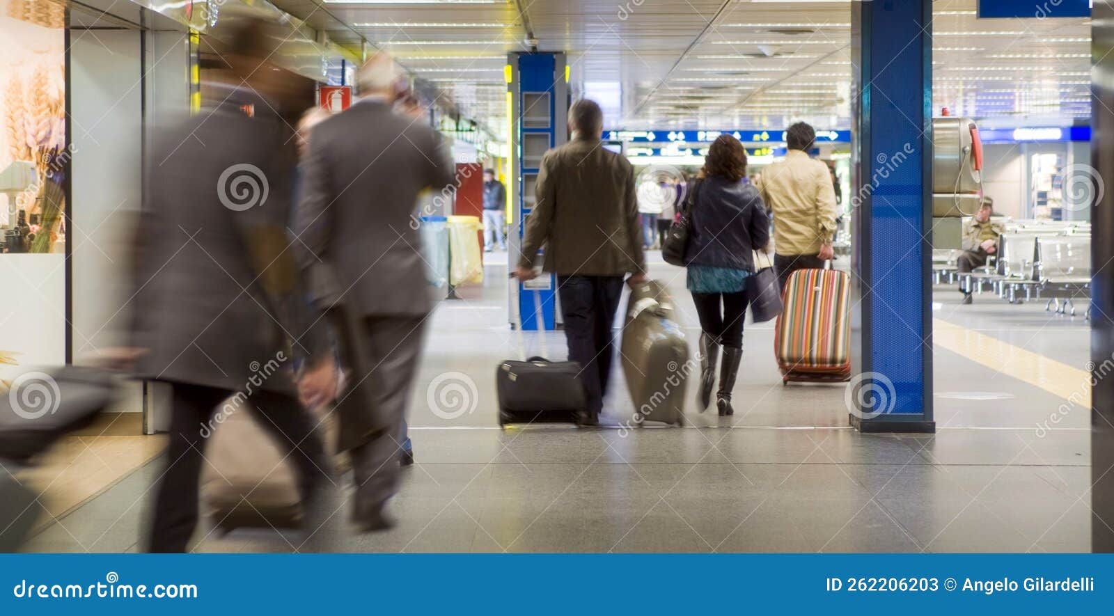 Airport Interior with Passengers Dragging Their Luggage and Going To ...
