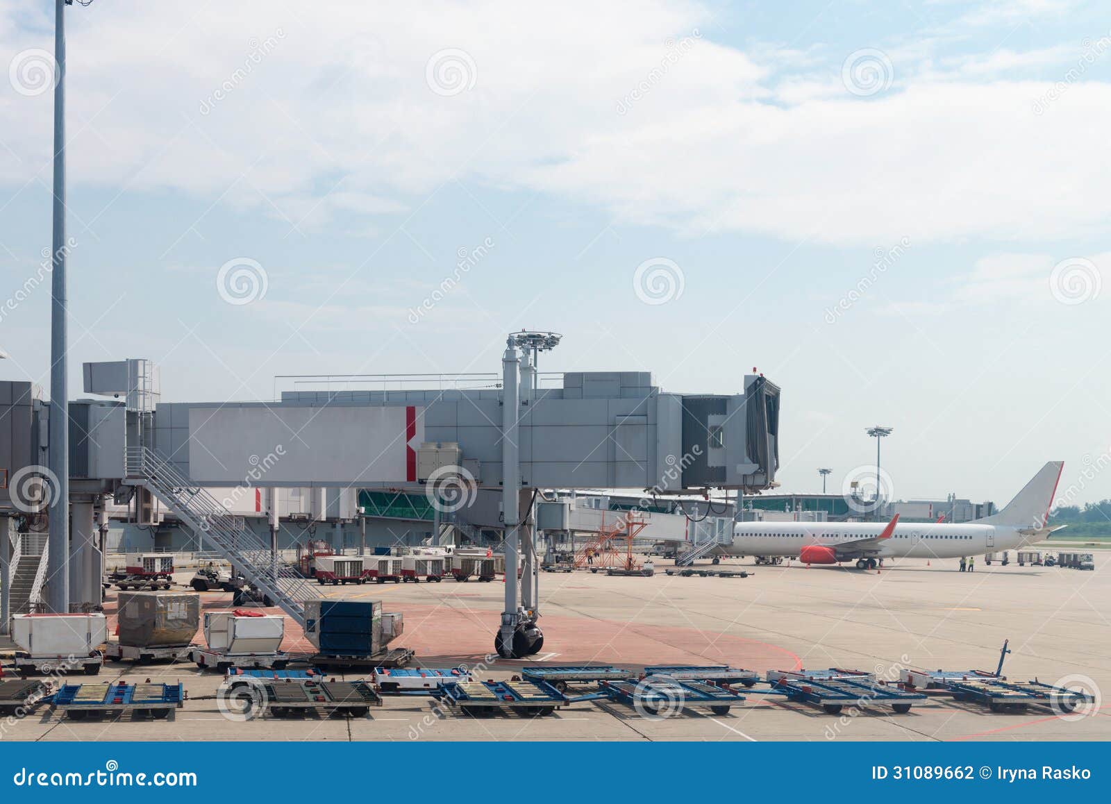 Airport Jetway and Airplane Stock Photo - Image of luggage, land: 31089662