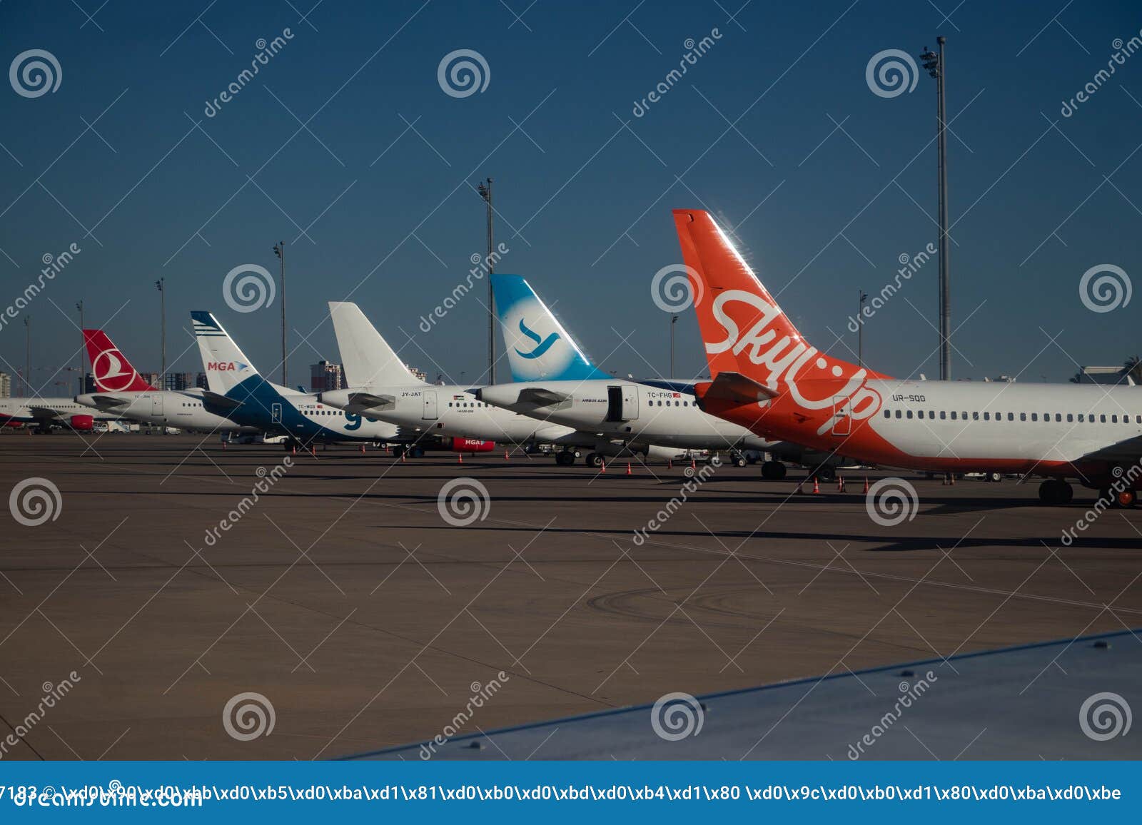 An Airport with Planes of Different Airlines Editorial Stock Photo ...