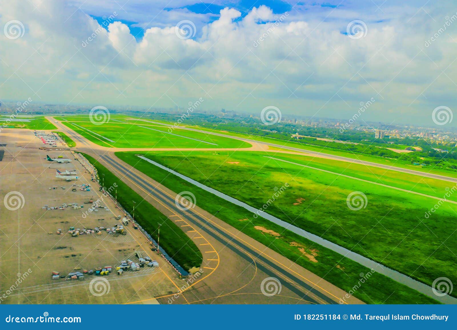 Airport Runway within a City Stock Photo - Image of landscape, view ...
