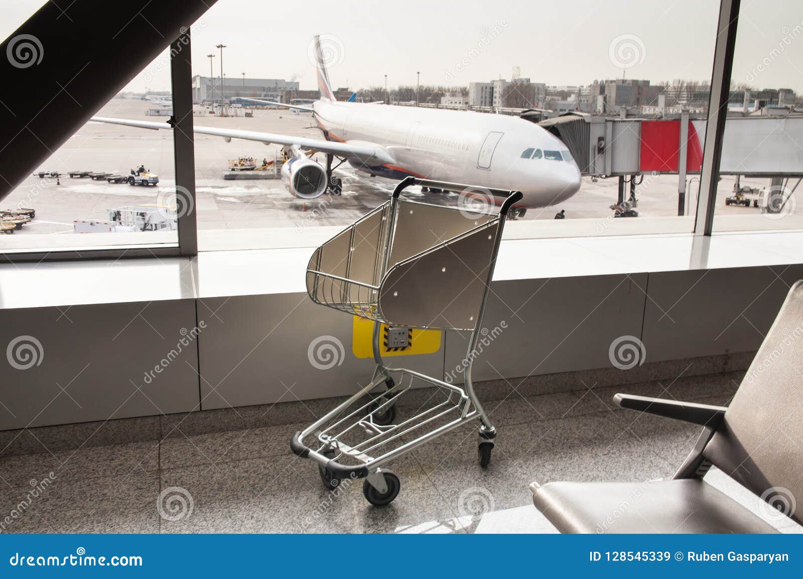 The airport trolley stock image. Image of suitcase, passenger - 128545339