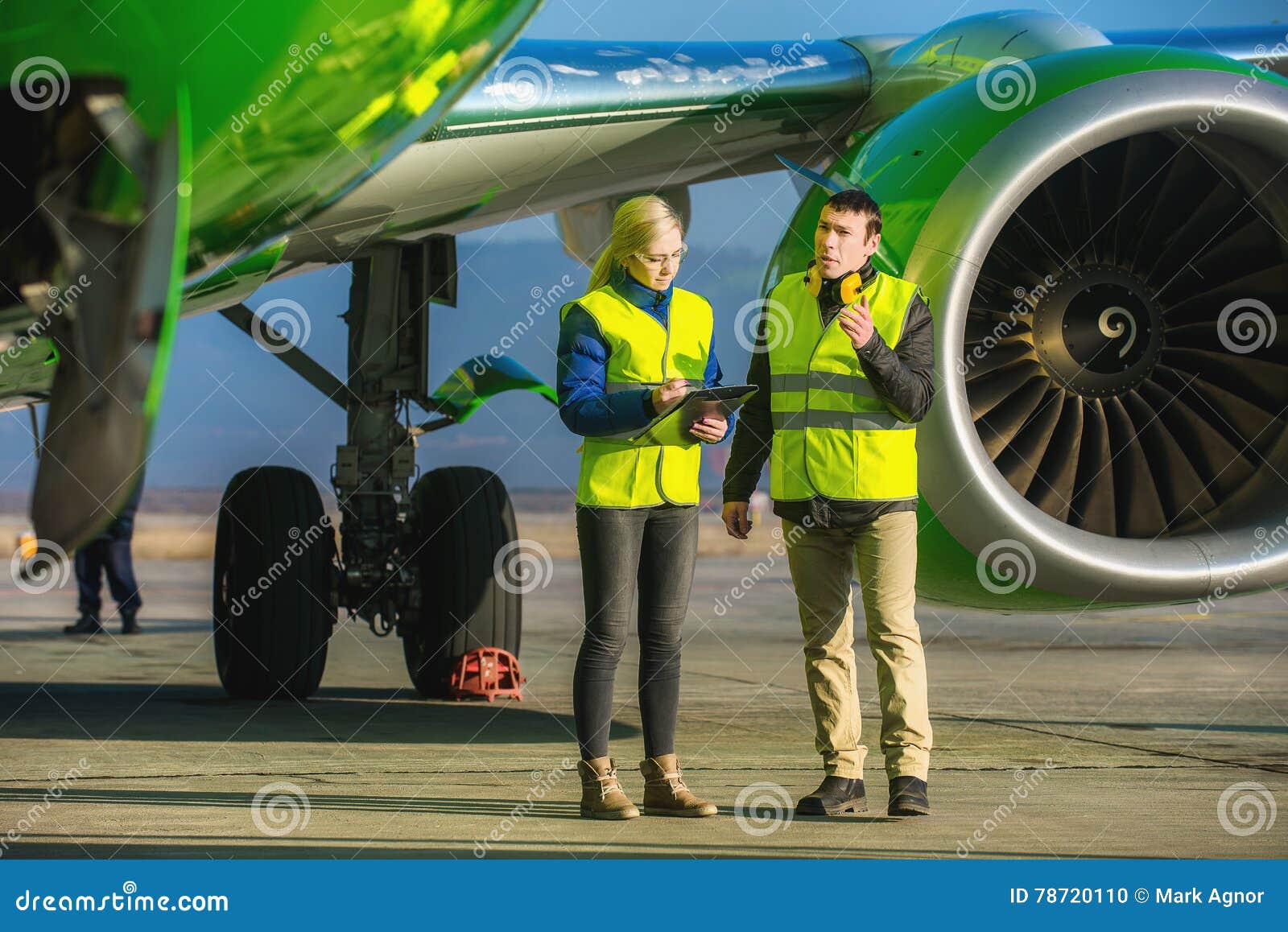 Airport Workers Handling Airplane Stock Photo - Image of person ...