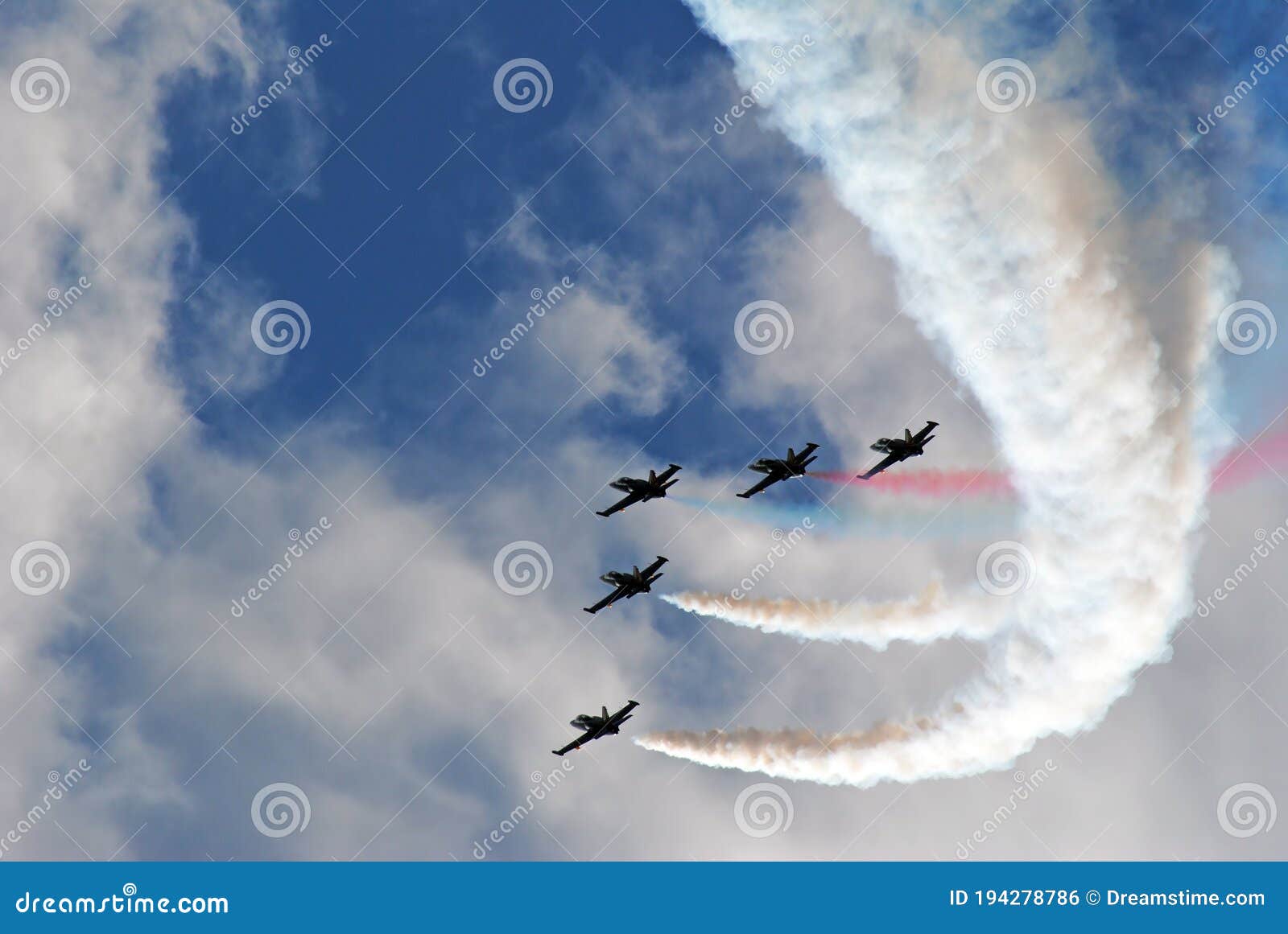 Airshow Planes Group with Smoke Against the Blue Sky Stock Photo ...