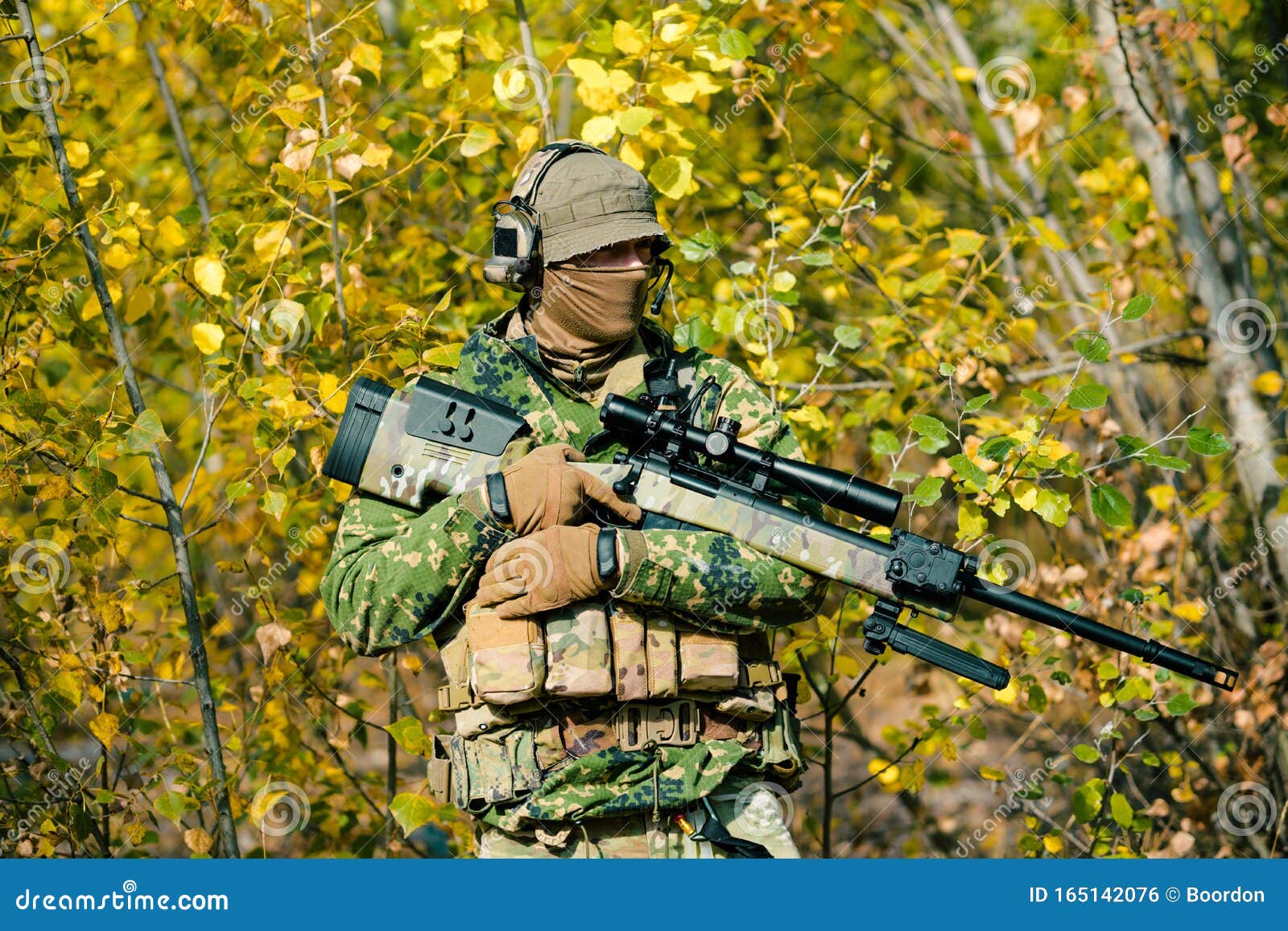 Airsoft Man in Uniform Hold Sniper Rifle on Yellow Forest Backdrop ...