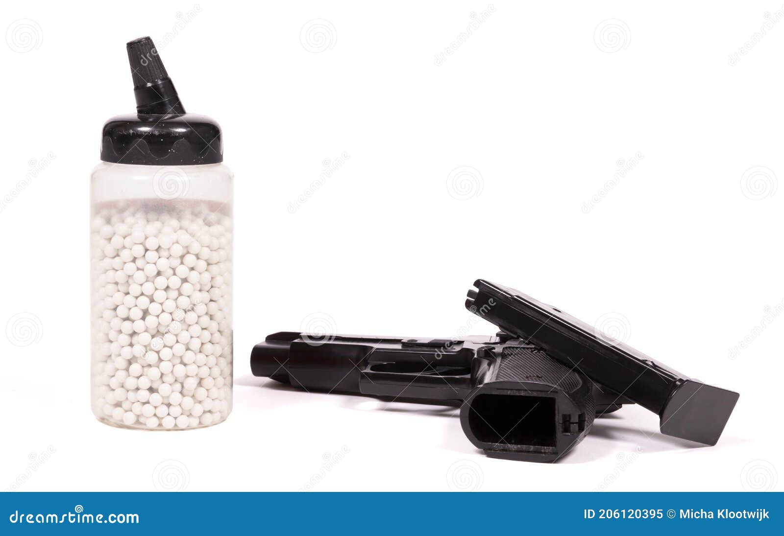 BB Gun, Old Airsoft Pistol Toy And Magazine With BB Gun Bullets On Wood ...