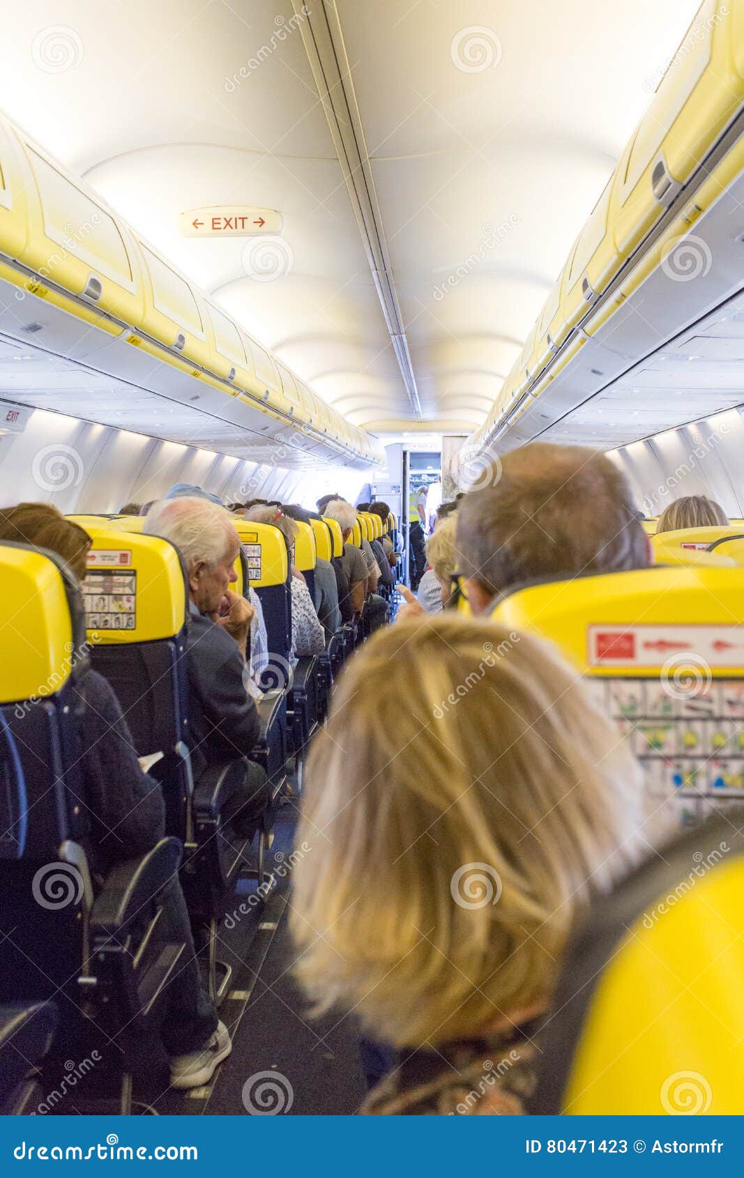 Aisle in an airplane editorial stock photo. Image of onboard - 80471423