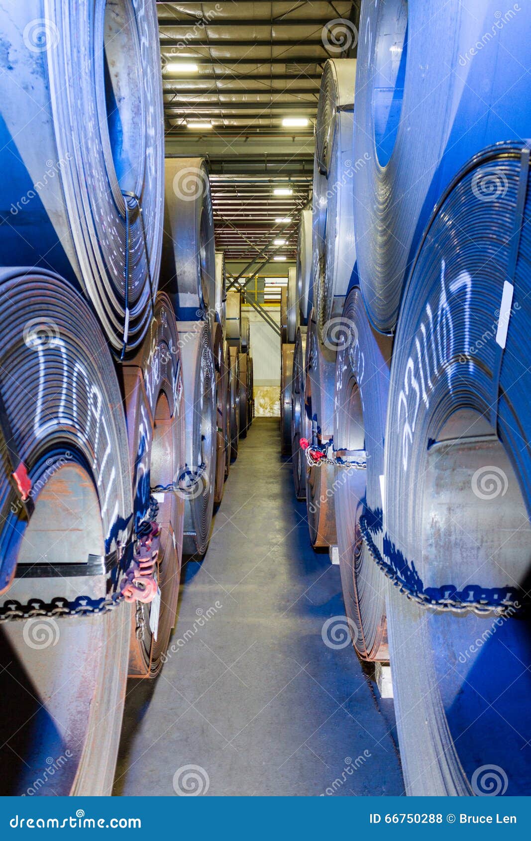 Aisle between Rows of Stacked Master Coils Stock Photo - Image of steel ...