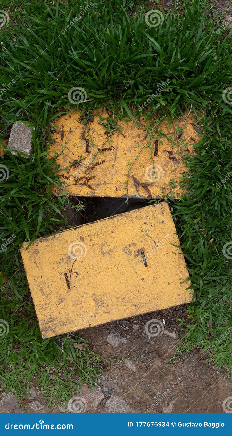 The Ajar Yellow Manhole Cover Stock Photo - Image of manhole, ajar ...