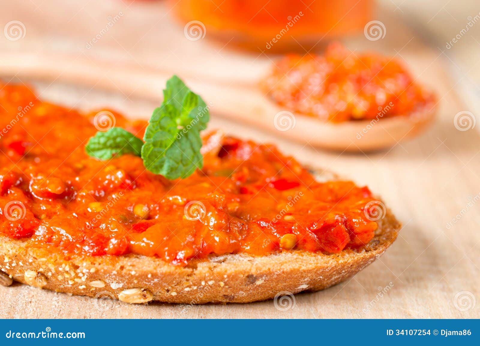 Ajvar on the bread stock photo. Image of brown, indigo - 34107254