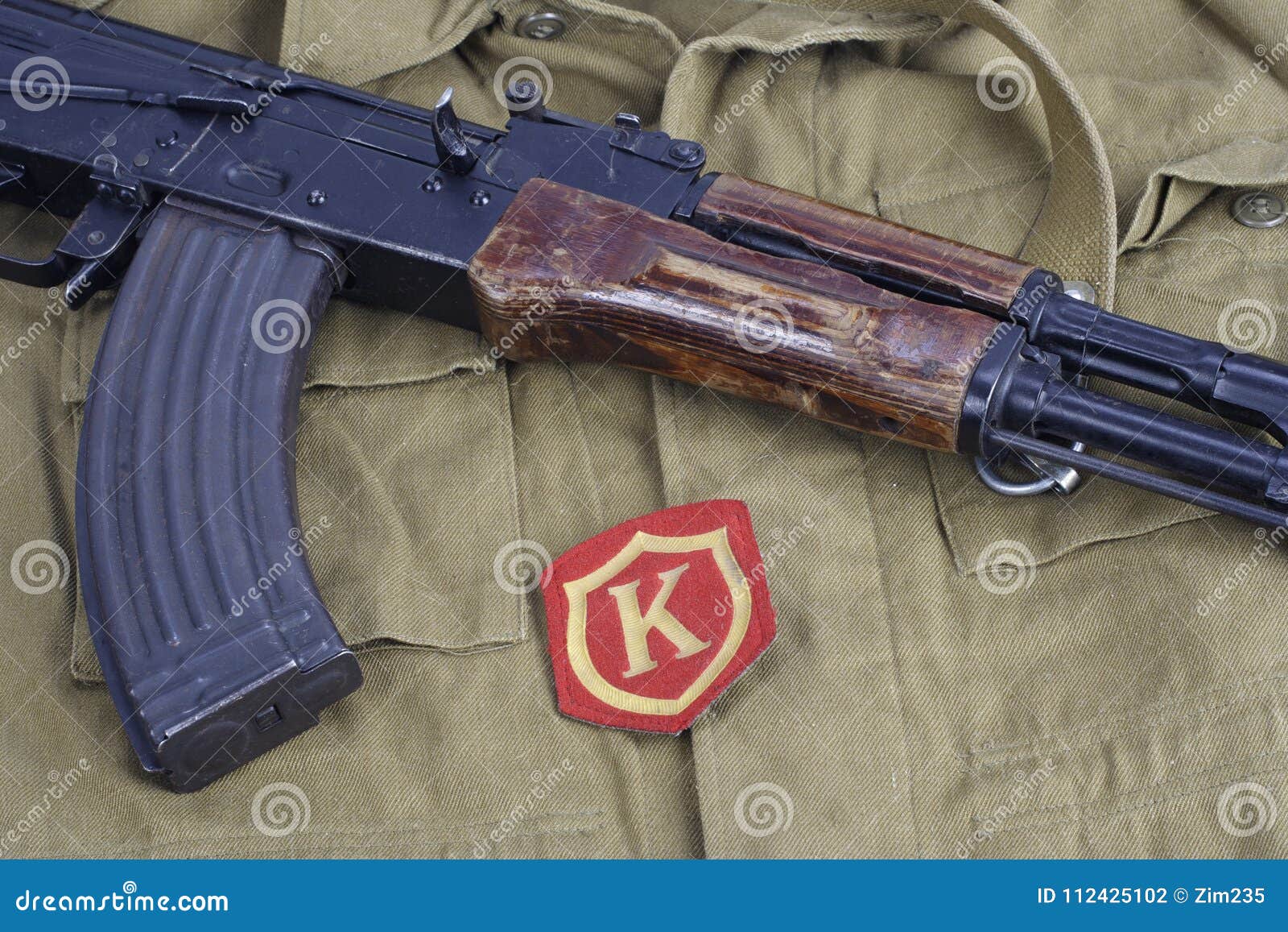 AK47 with Soviet Army Commandant Shoulder Patch on Khaki Uniform ...
